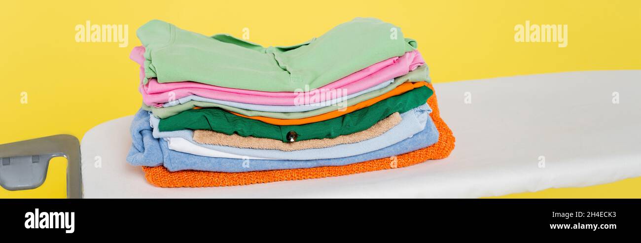close up view of clean laundry on ironing board, banner Stock Photo - Alamy