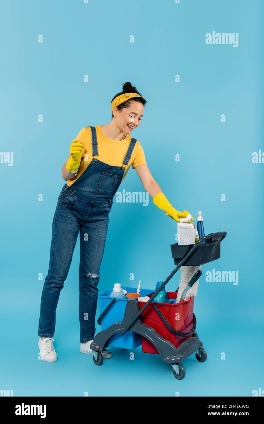 Commercial cleaner blue overalls hi-res stock photography and images ...