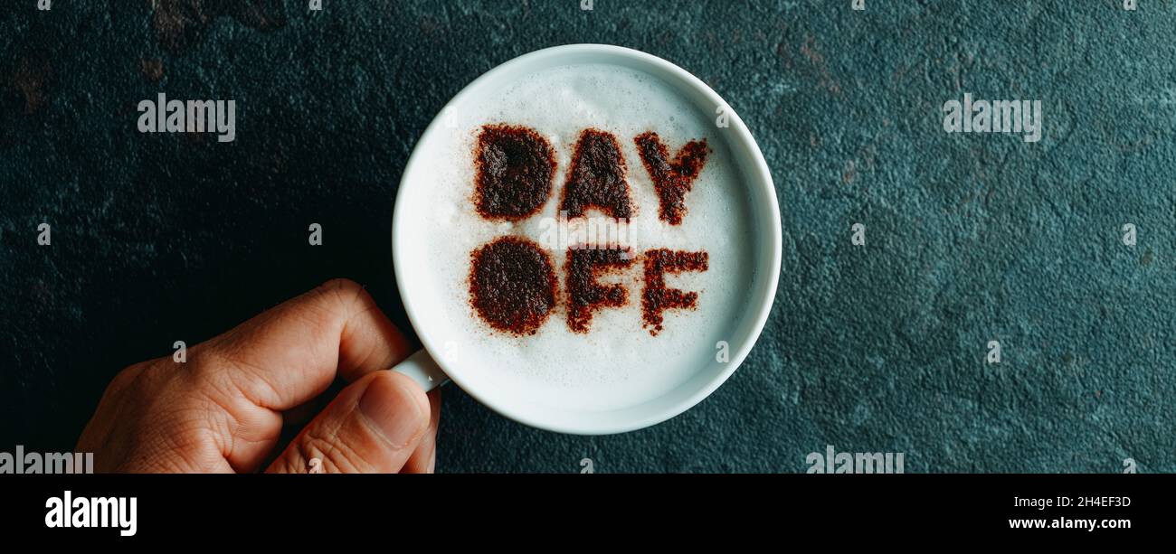 a man has a cup of cappuccino in his hand with the text day off written ...