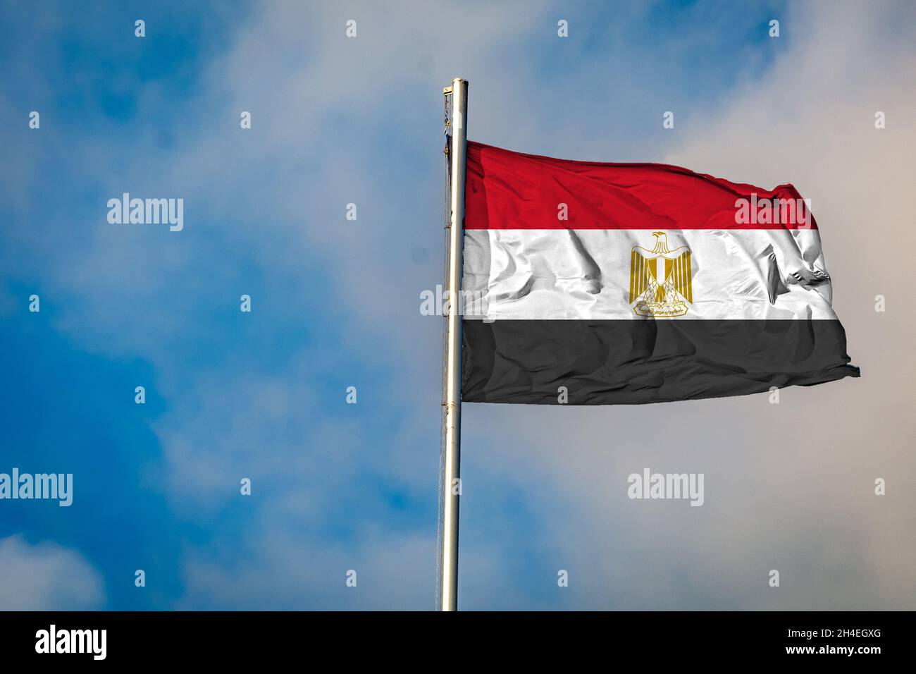 Egypt flag on flag pole hi-res stock photography and images - Alamy
