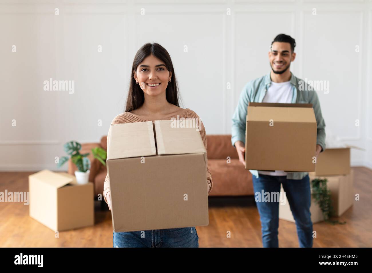 Relocation concept excited young hi-res stock photography and images ...