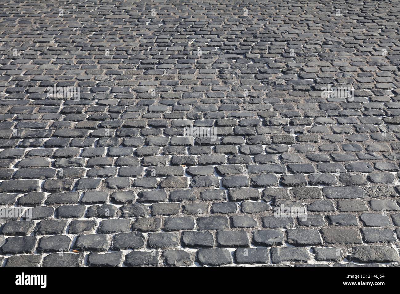 Stone paved street. Old stone pavement. Cobblestone in Germany. Cologne ...