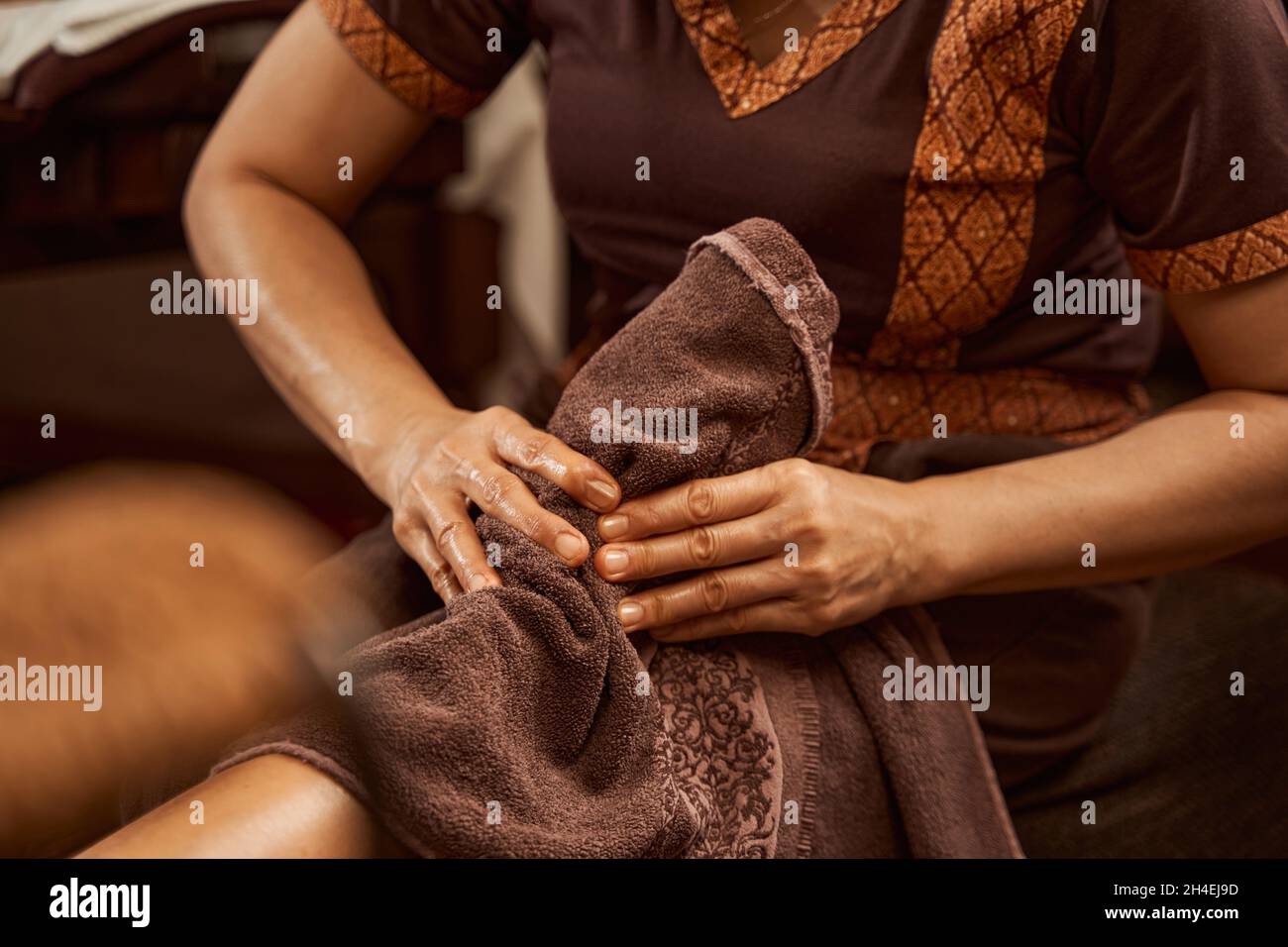 Licensed reflexologist is giving patient reflexology massage Stock Photo - Alamy