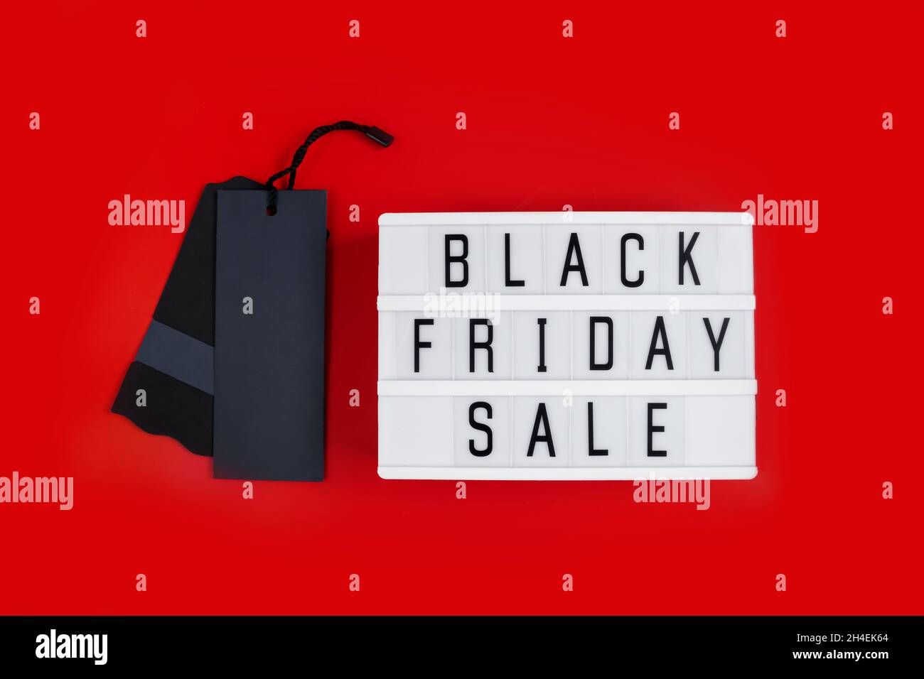 Black Friday sale concept. Label and lightbox on red background Stock ...