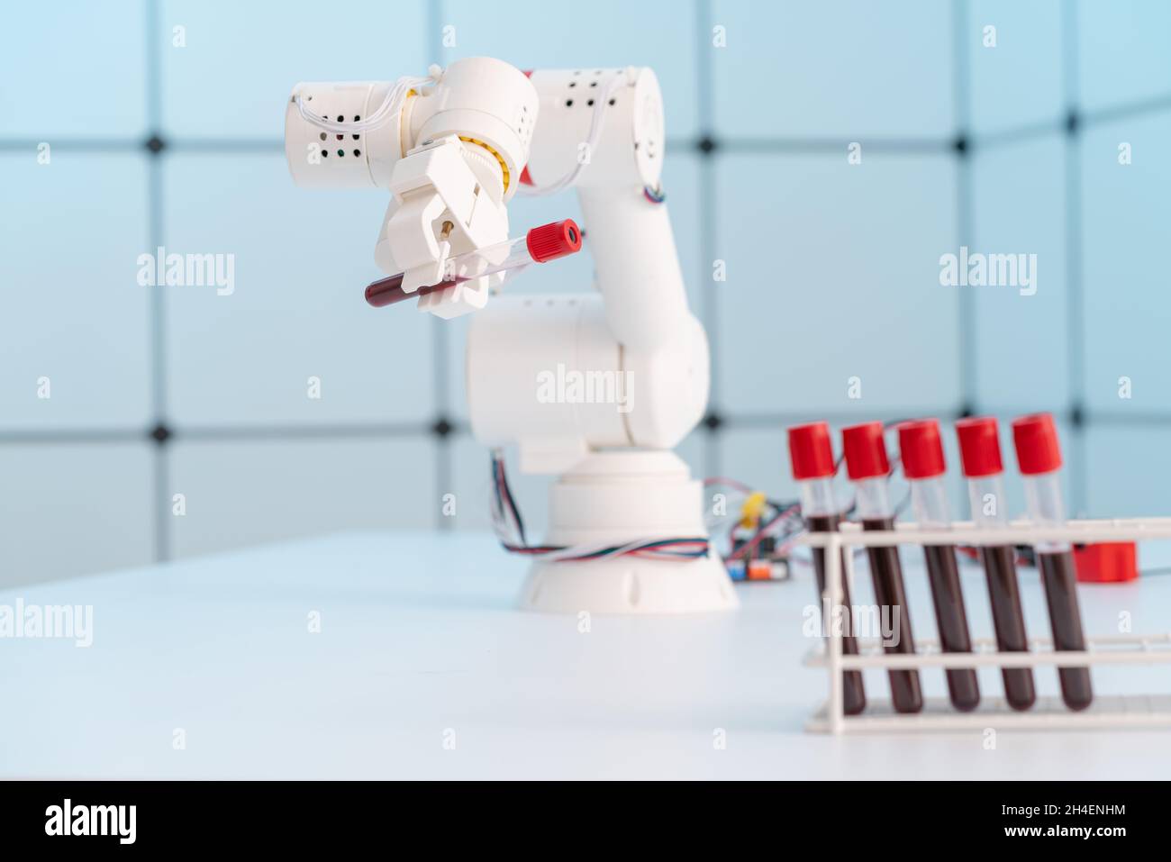 Robot arm with test tube for biological experiments in laboratory Stock ...