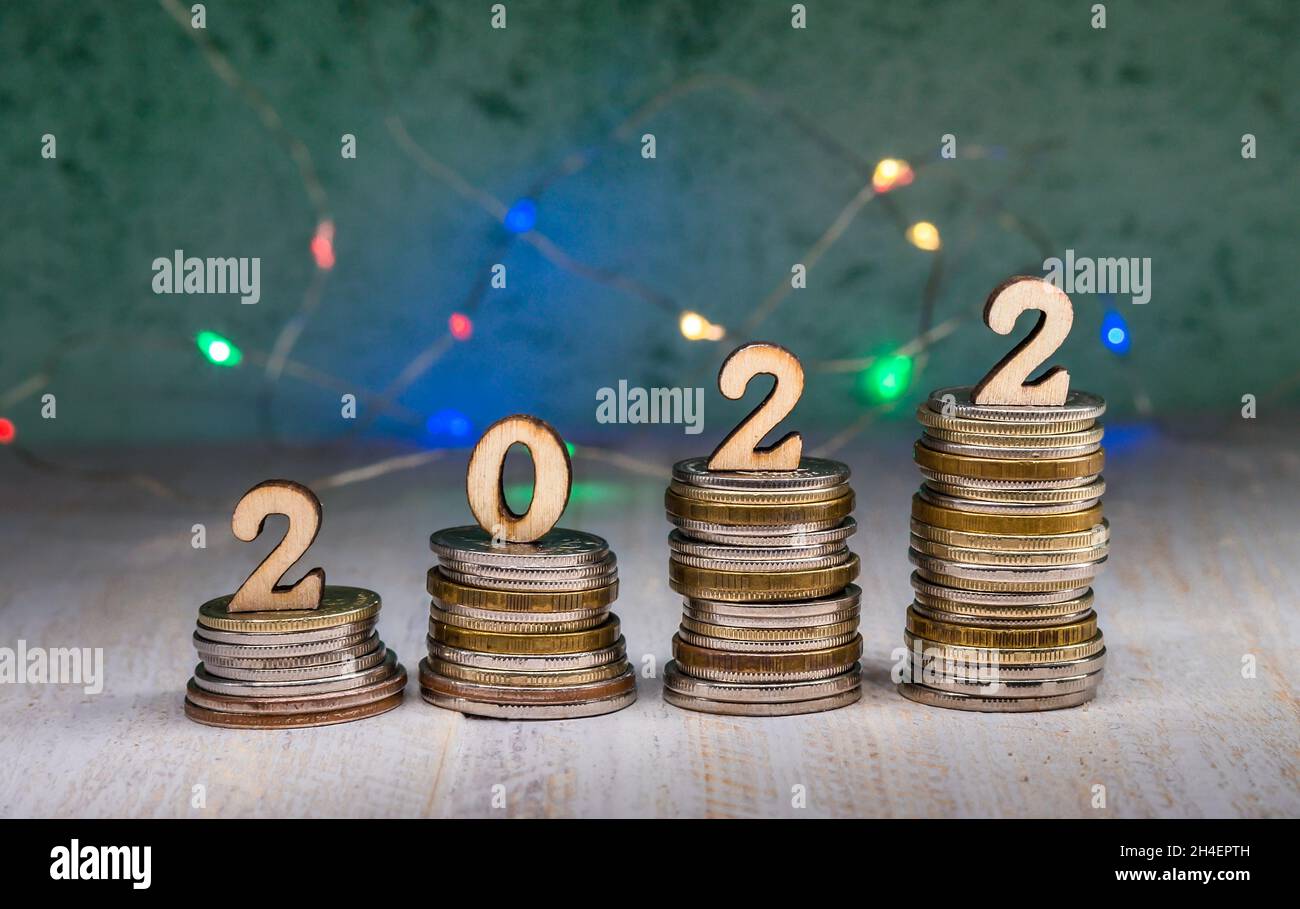 Coins and Figures 2022. Banner 2022. Money stacked in columns Stock ...