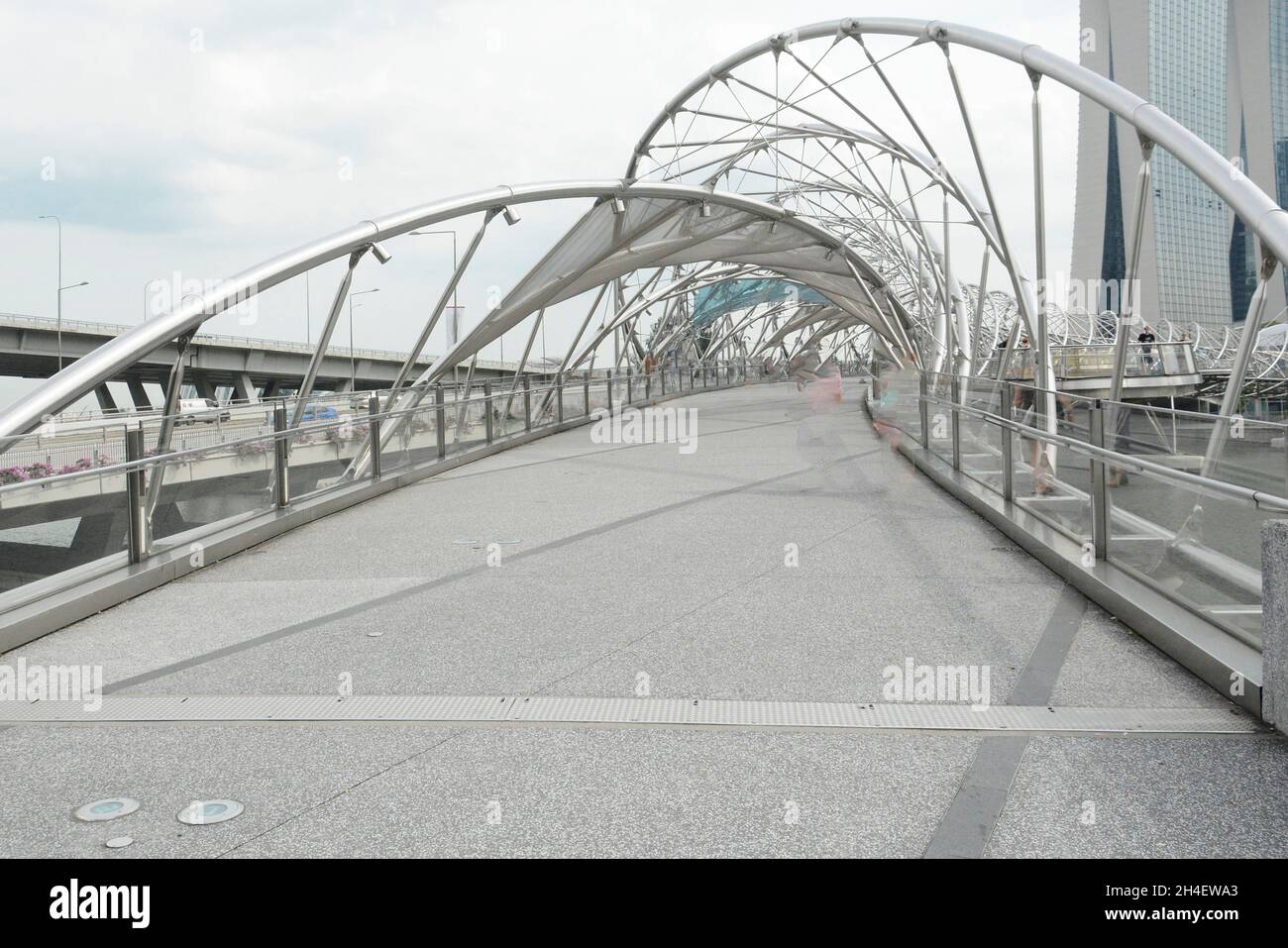 flyover designed with spiral truss running along the road Stock Photo ...