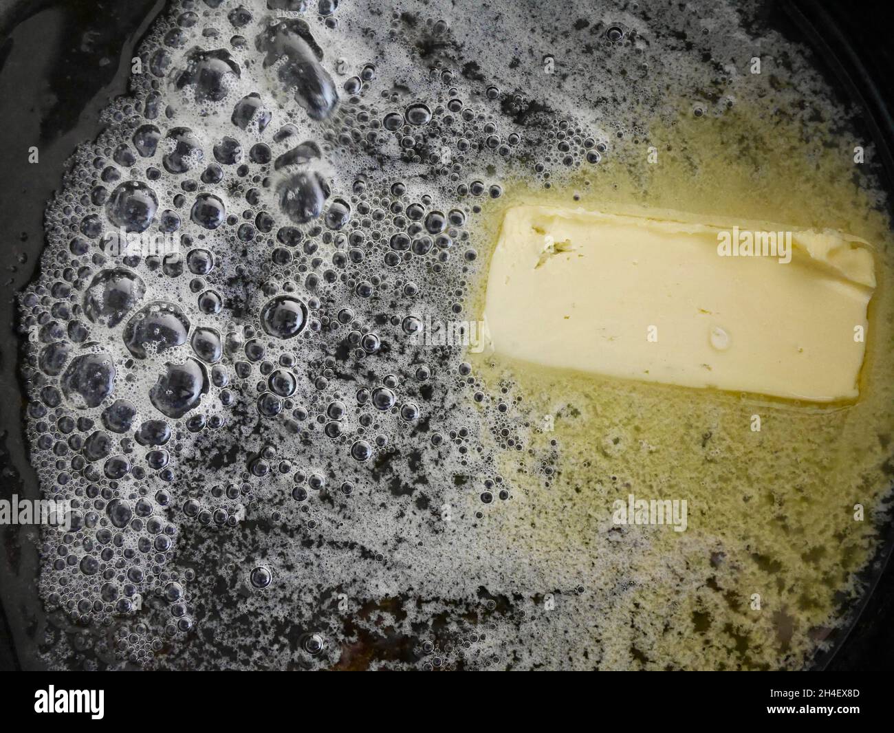 Butter melting a pan hi-res stock photography and images - Alamy