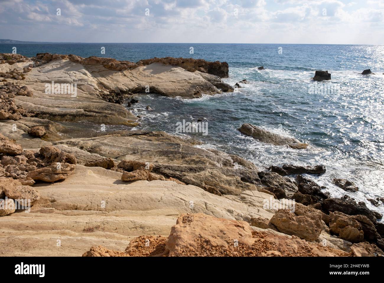 Limestone rock formations on the coastline near Coral Bay, Peyia ...