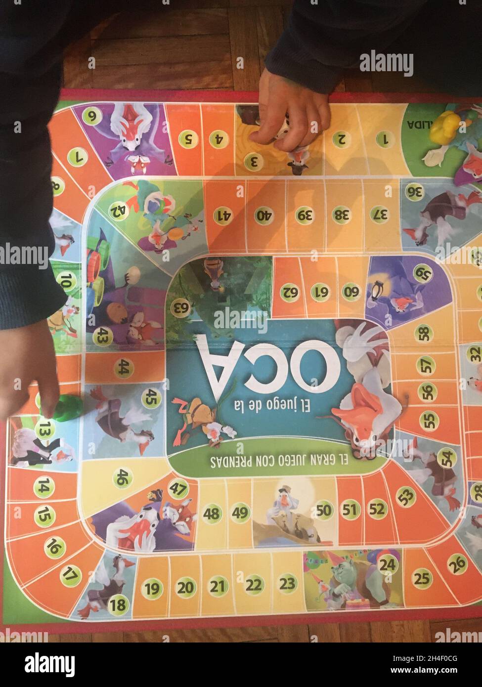 children playing the goose game Stock Photo - Alamy