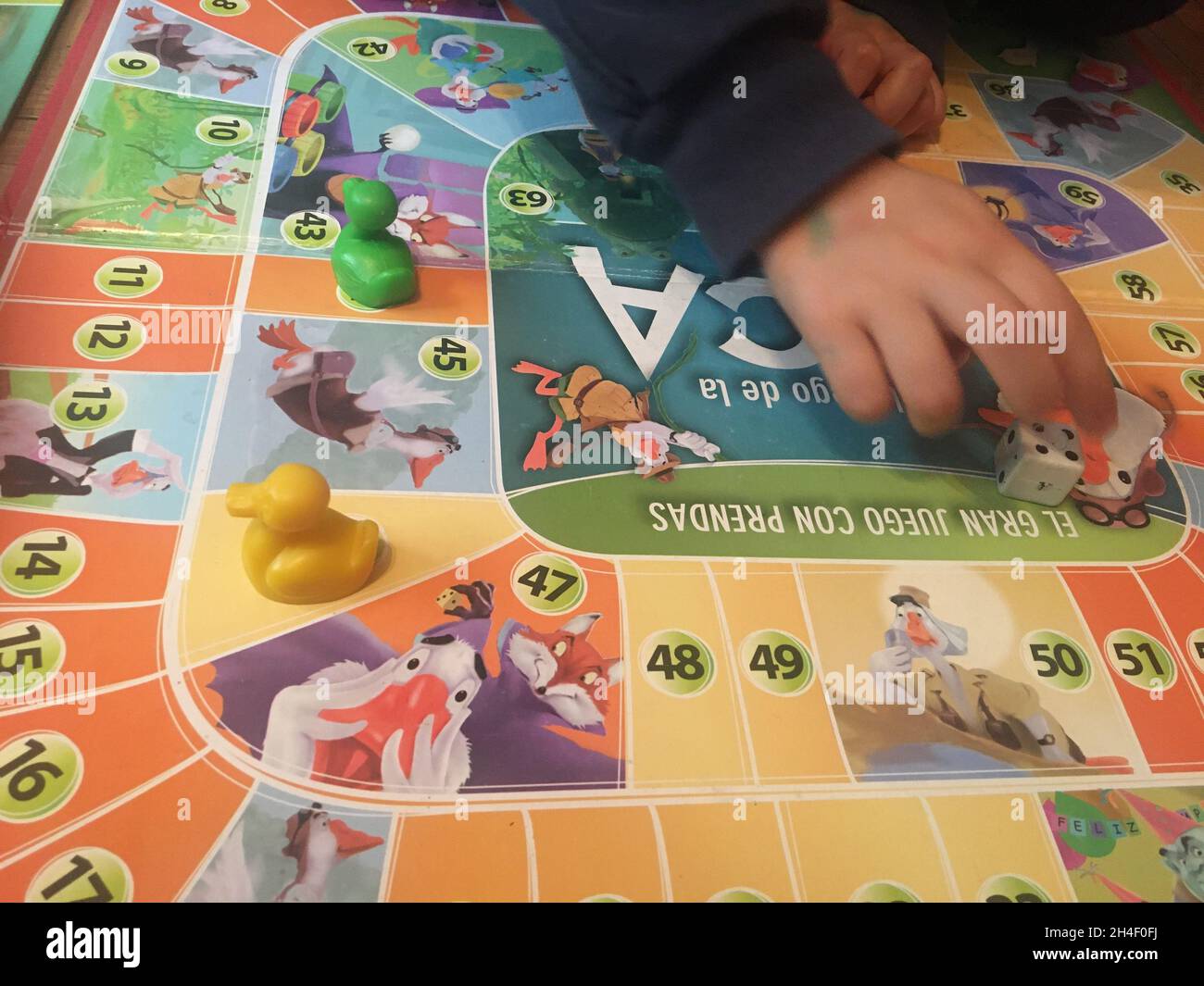 children playing the goose game Stock Photo - Alamy