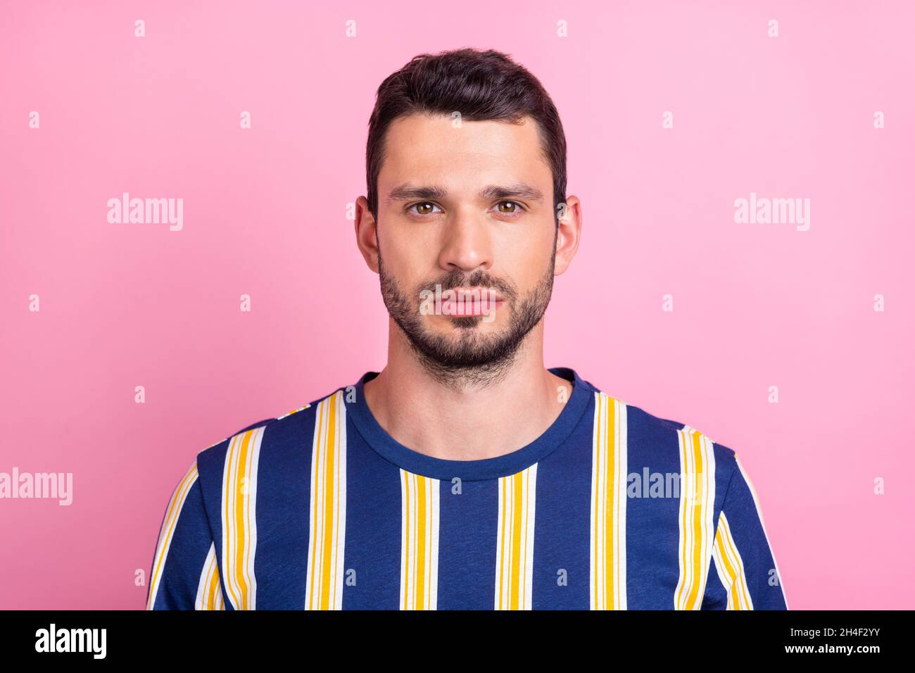Photo Portrait Serious Man Wearing Striped T Shirt Isolated Pastel Pink