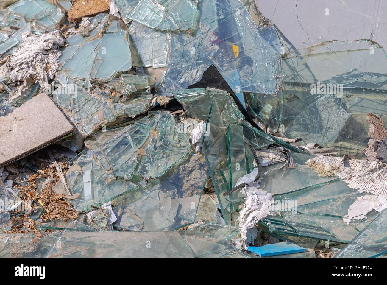 Big Bunch of Broken Glass Windows Debris Damage Stock Photo - Alamy