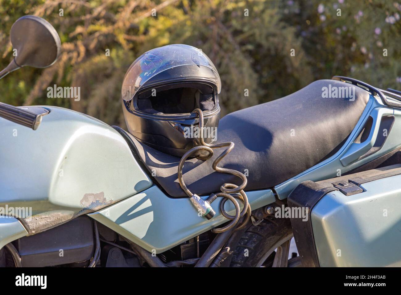 Safety Helmet Chained to Big Motorcycle Protection Stock Photo - Alamy