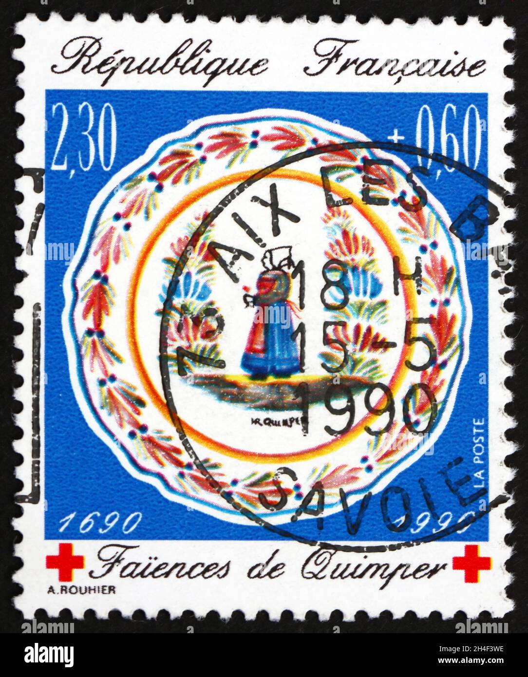 FRANCE - CIRCA 1990: a stamp printed in France shows Quimper of ...