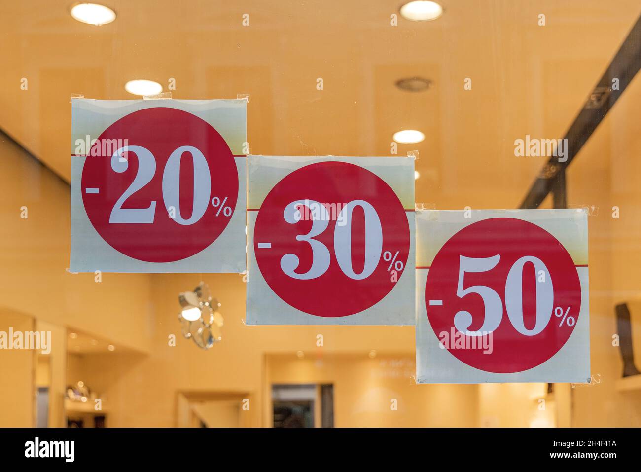 Sale Percents Minus Numbers Sign at Shop Window Stock Photo - Alamy