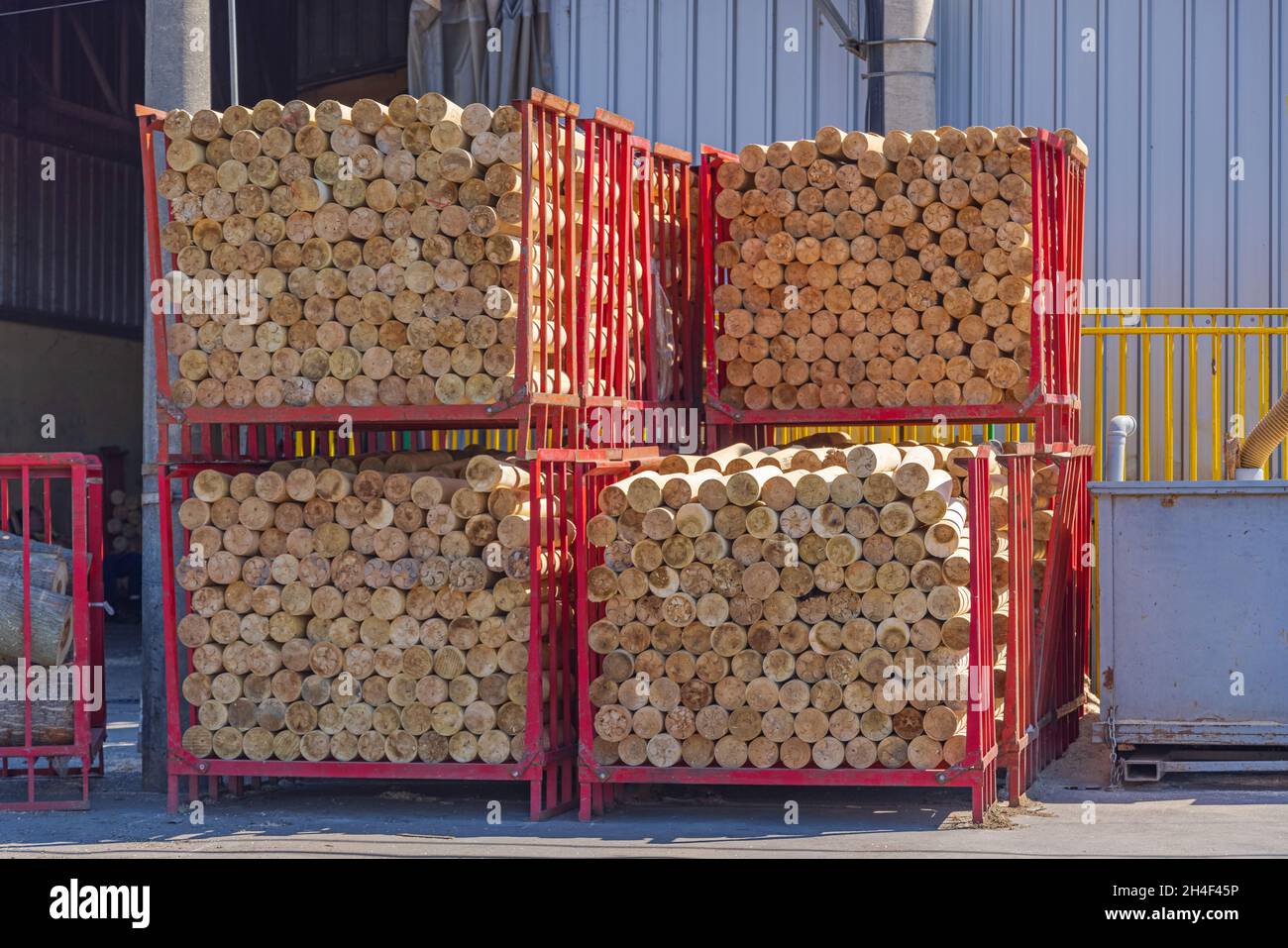 Short Wood Logs Stacked at Rack Frame Storage Stock Photo - Alamy