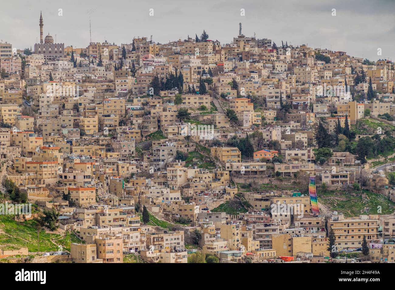 Skyline of Amman with houses on steep slopes, Jordan Stock Photo - Alamy
