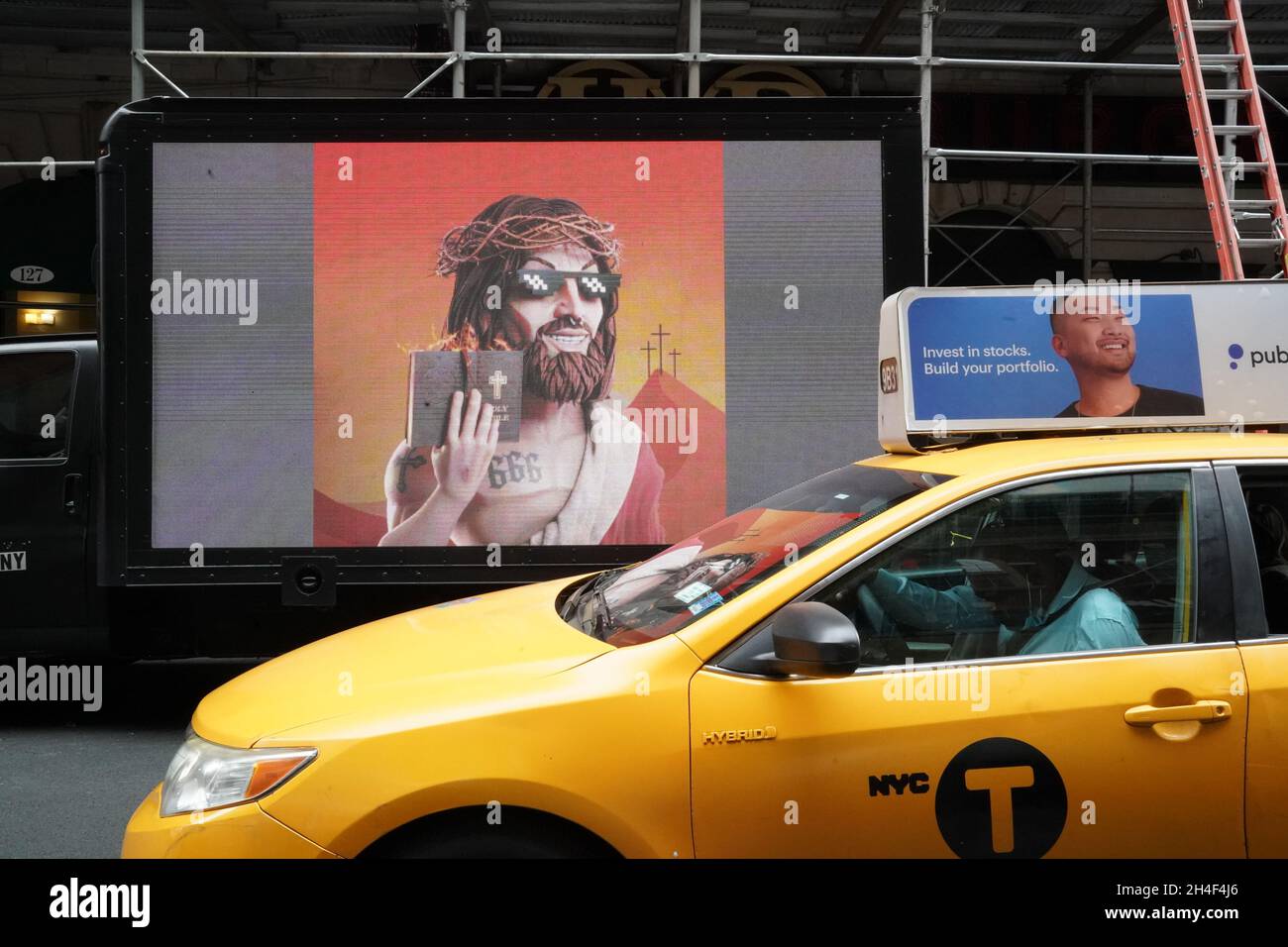 New York, NY, USA. 2nd Nov, 2021. An ad for a Jesus NFT from The Holy ...