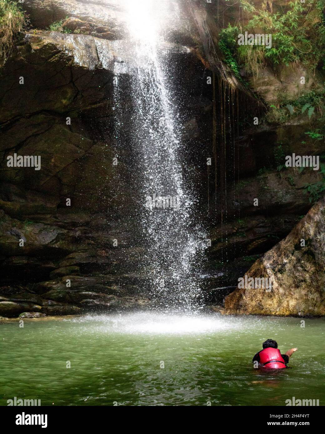 Vertical shot of a beautiful waterfall Stock Photo - Alamy