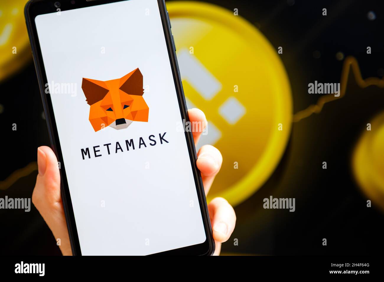 Ukraine, Odessa - October, 9 2021: Hand holding mobile with MetaMask ...