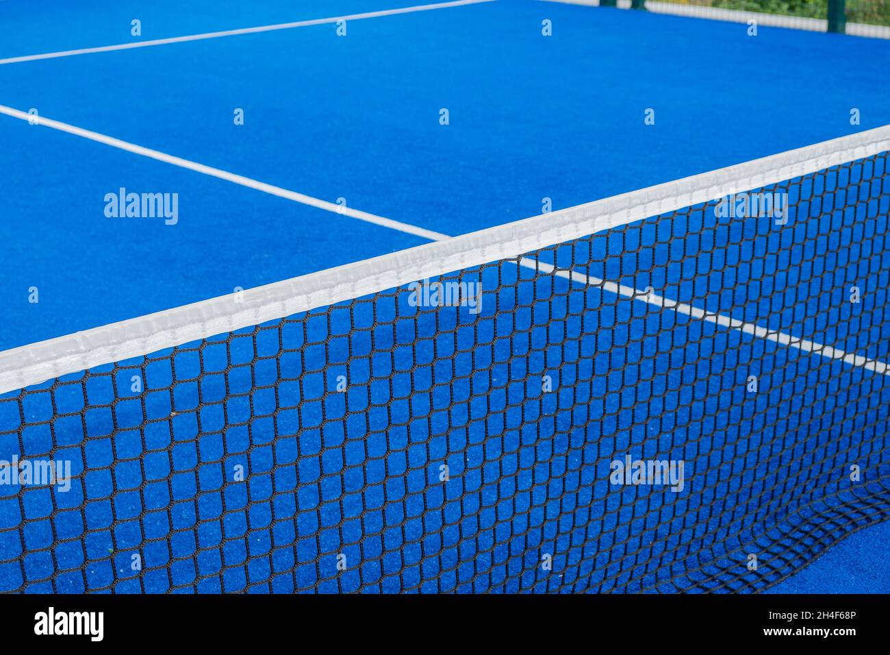 blue paddle tennis court net Stock Photo - Alamy