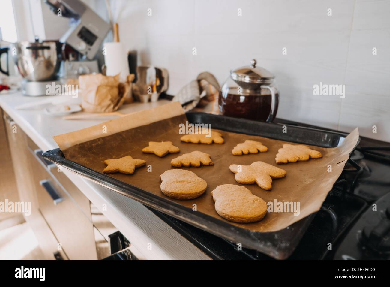 Christmas homemade gingerbread biscuit at baking pan on home kitchen ...