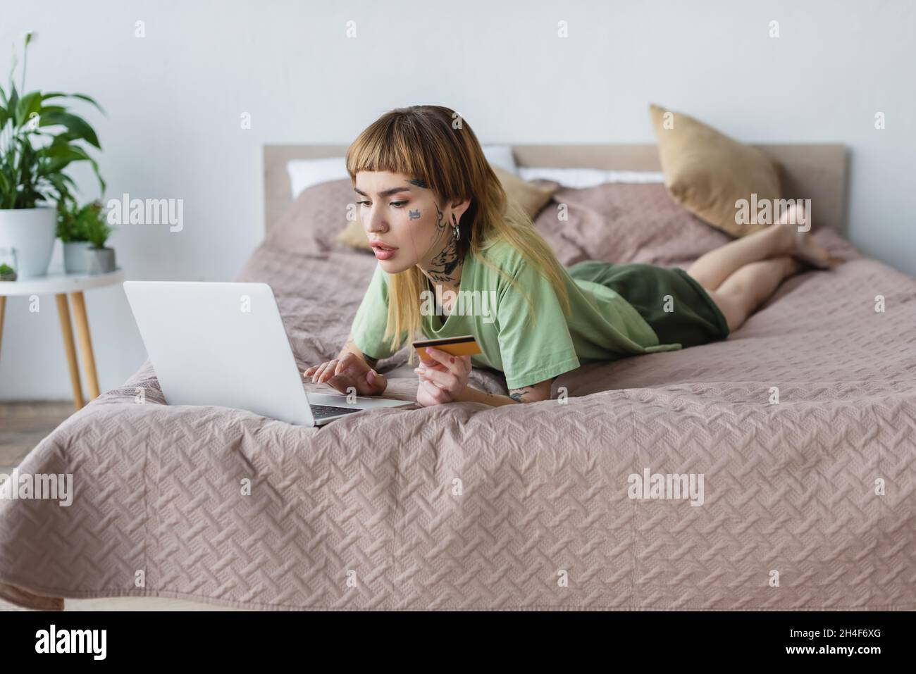 Woman lying bed full body hi-res stock photography and images - Alamy