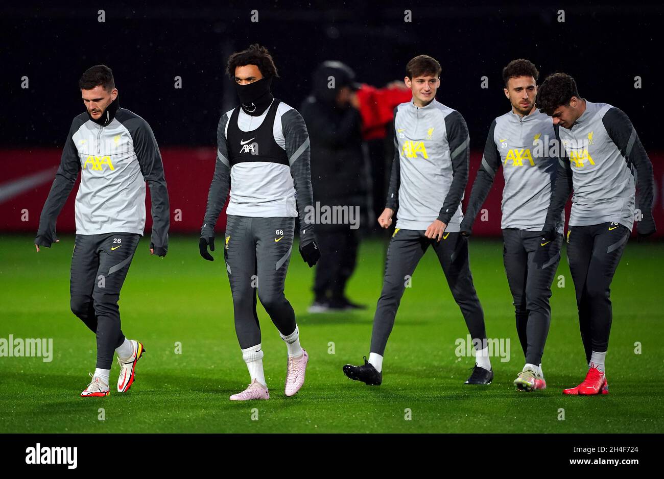 Liverpool's Trent Alexander-Arnold (second left) and Andrew Robertson ...