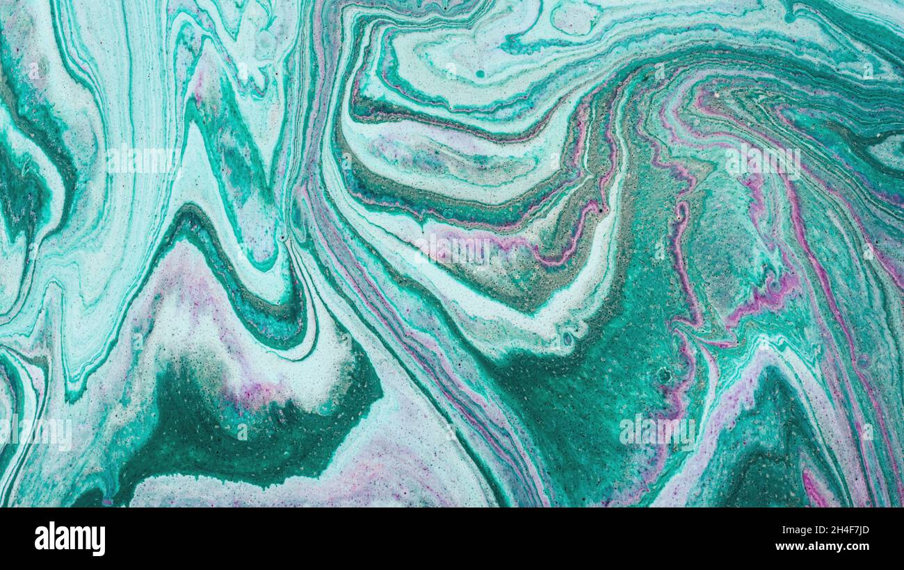 Closeup of mixed turquoise and purple abstract marble texture. Hand ...