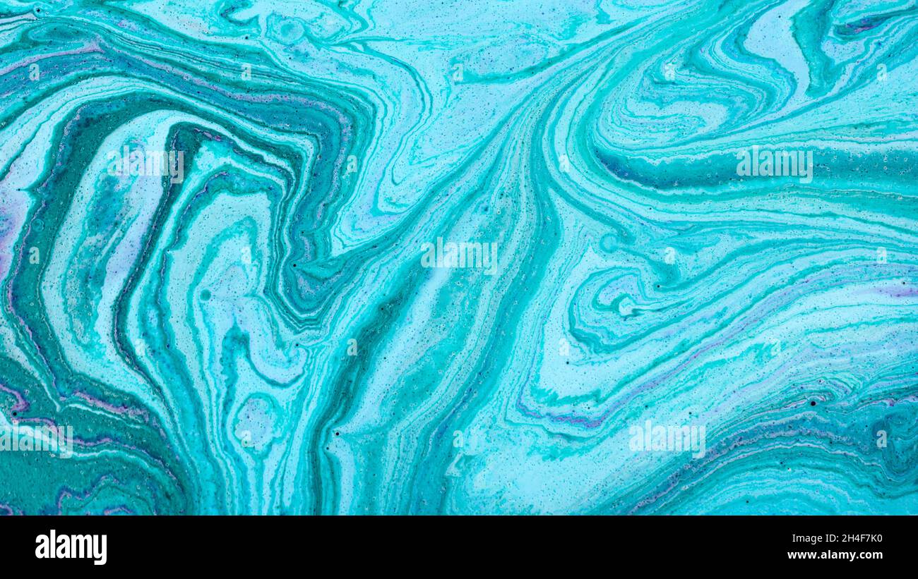 Closeup of mixed turquoise and purple abstract marble texture. Hand ...