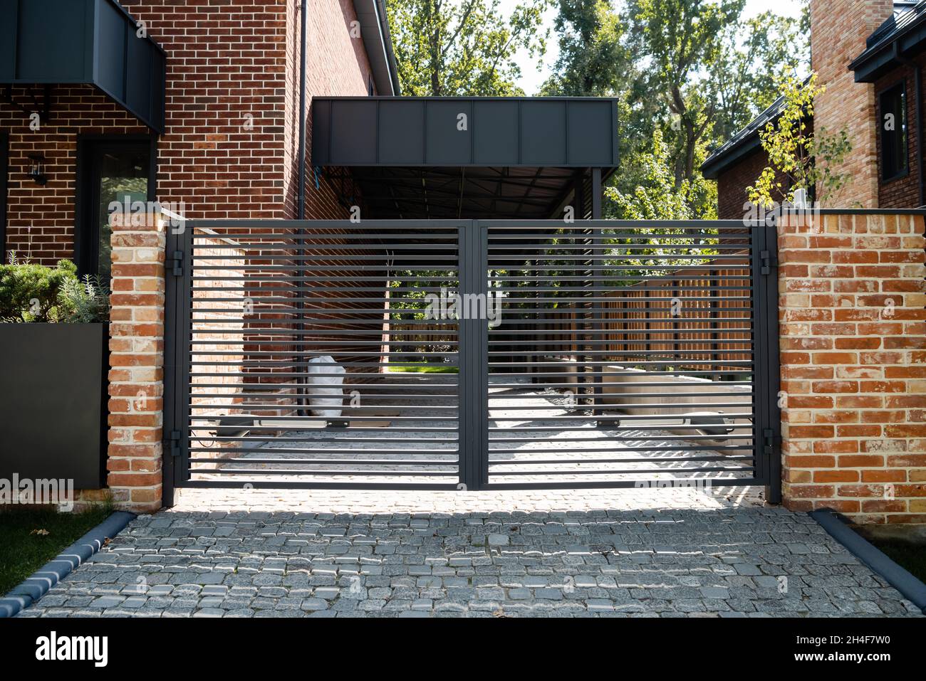 modern fence in outdoor garage space in house Stock Photo - Alamy
