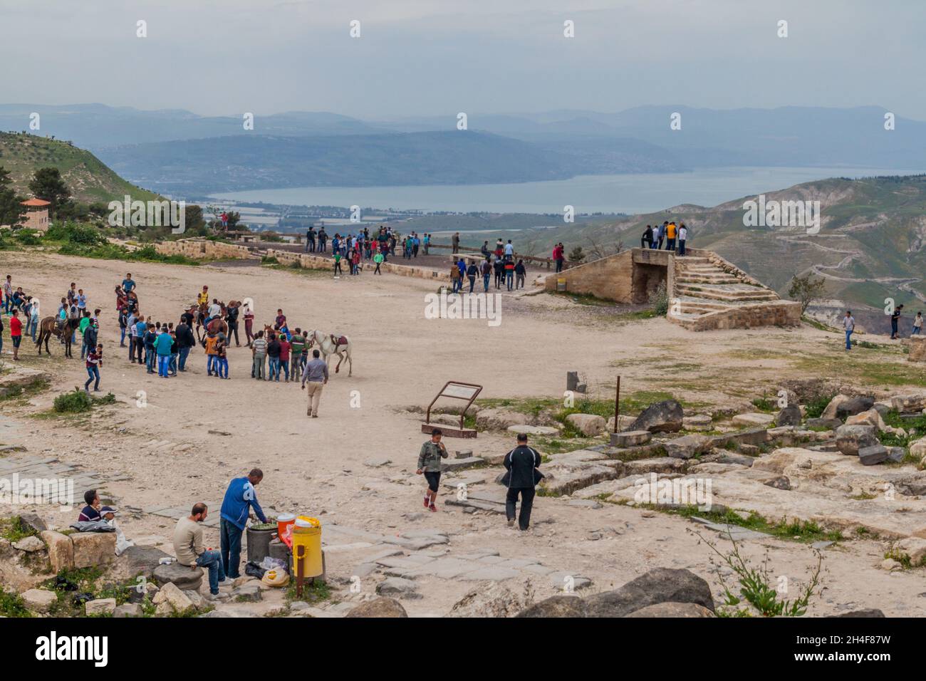 UMM QAIS, JORDAN - MARCH 30, 2017: Tourists visit the viewpoint of Sea ...
