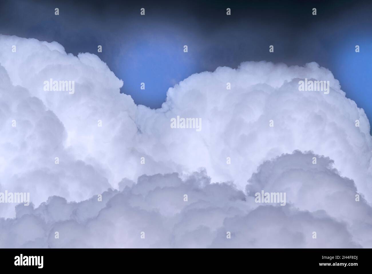 Dark threatening storm clouds and cumulus congestus cloud / towering ...