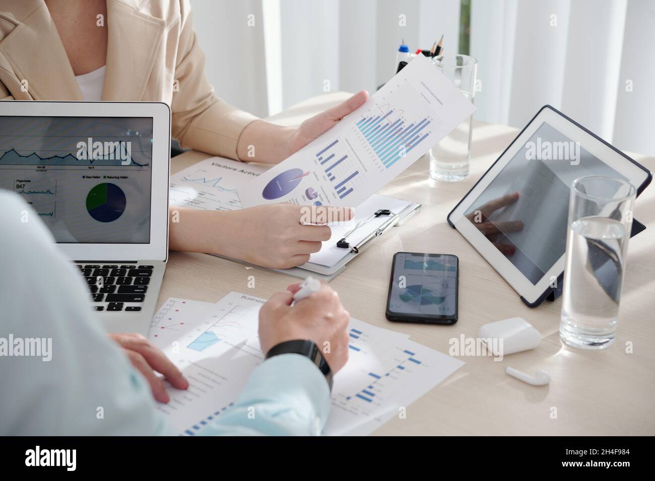 Business team checking financial charts hi-res stock photography and ...