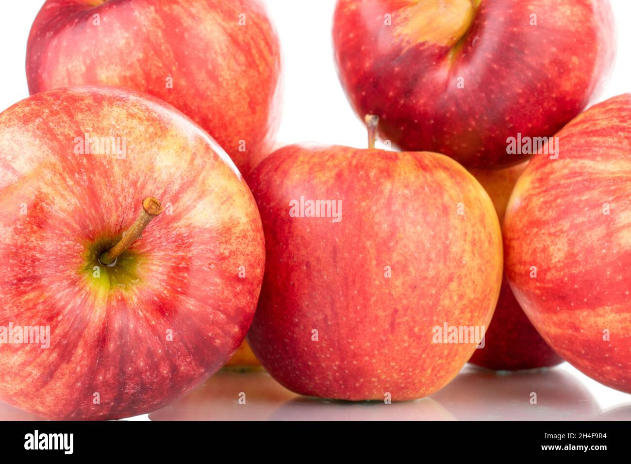 Several juicy red apples, close-up isolated on white Stock Photo - Alamy