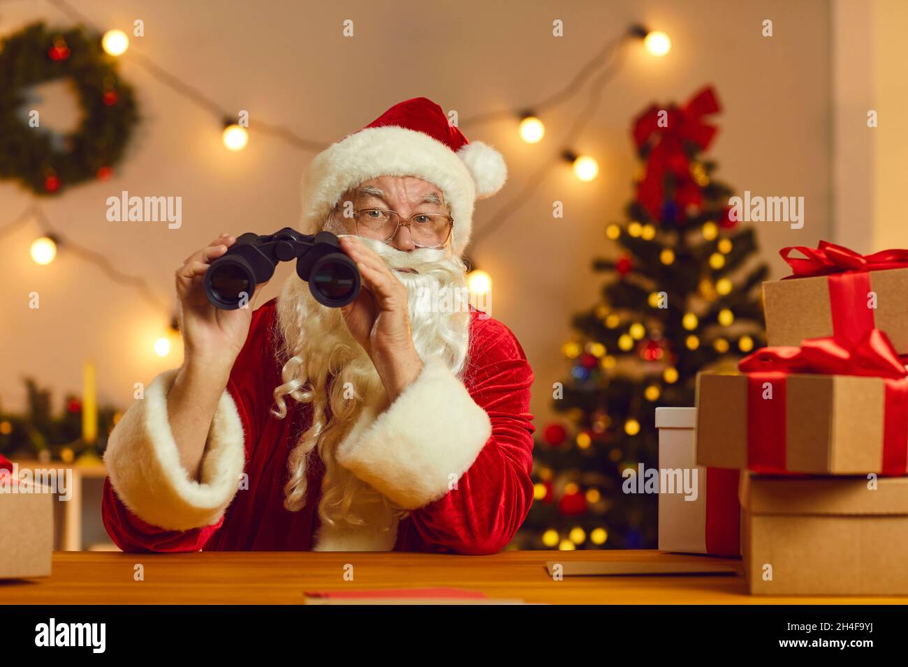 Old Father Christmas with binoculars spying on who's been naughty or ...