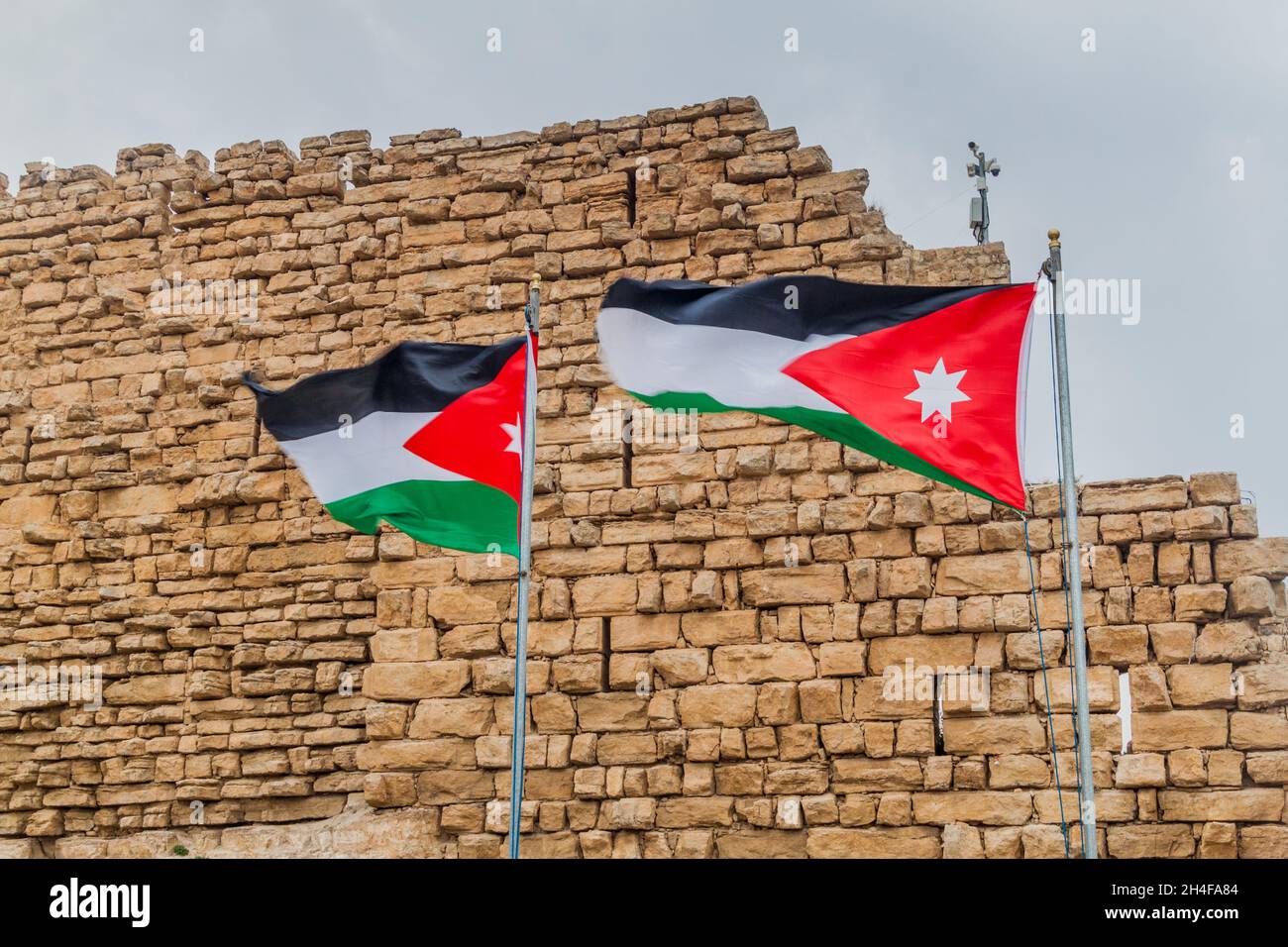 Flags of Jordan at the ruins of Karak castle, Jordan Stock Photo - Alamy