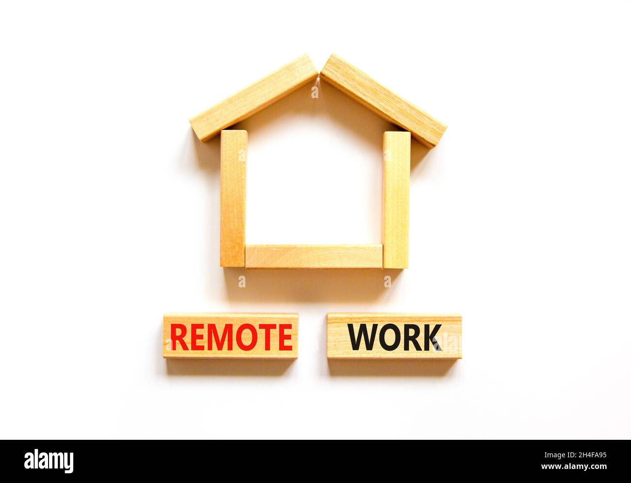 Remote work symbol. Concept words 'Remote work' on wooden blocks near ...