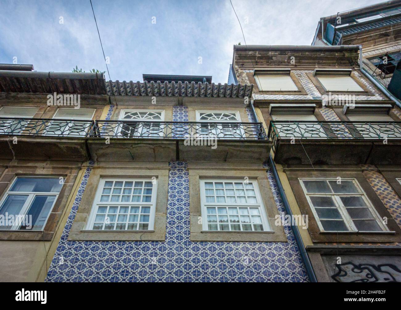 Tiled facades of ancient buildings in the city of Porto, Portugal Stock ...