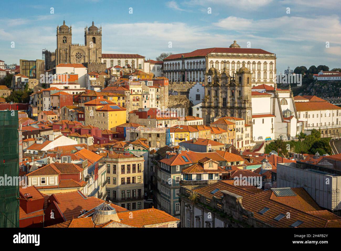 View of the city of Porto, Portugal across ancient tiled rooftops Stock ...