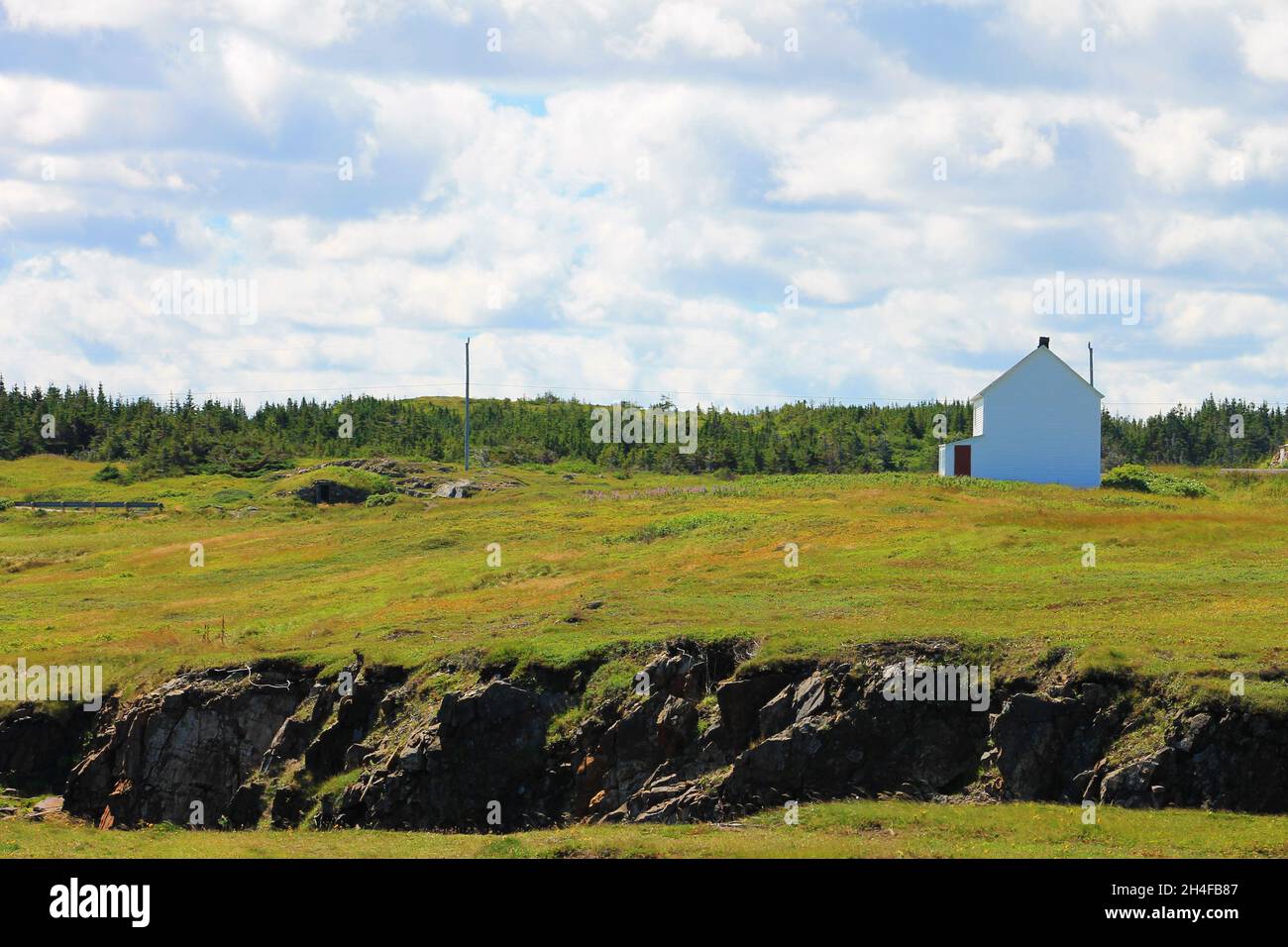 A traditional Newfoundland Saltbox house in a field, Elliston ...