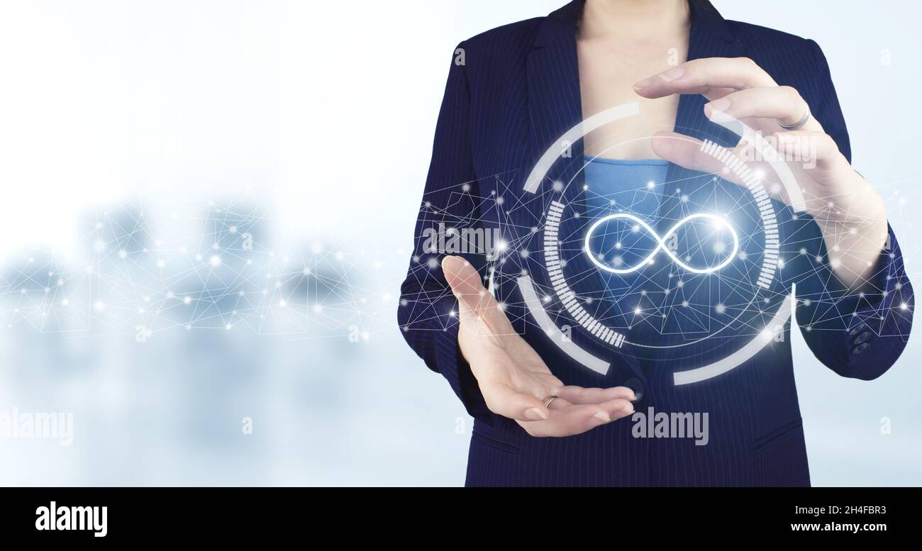 Infinite concept. Two hand holding virtual holographic infinity icon ...