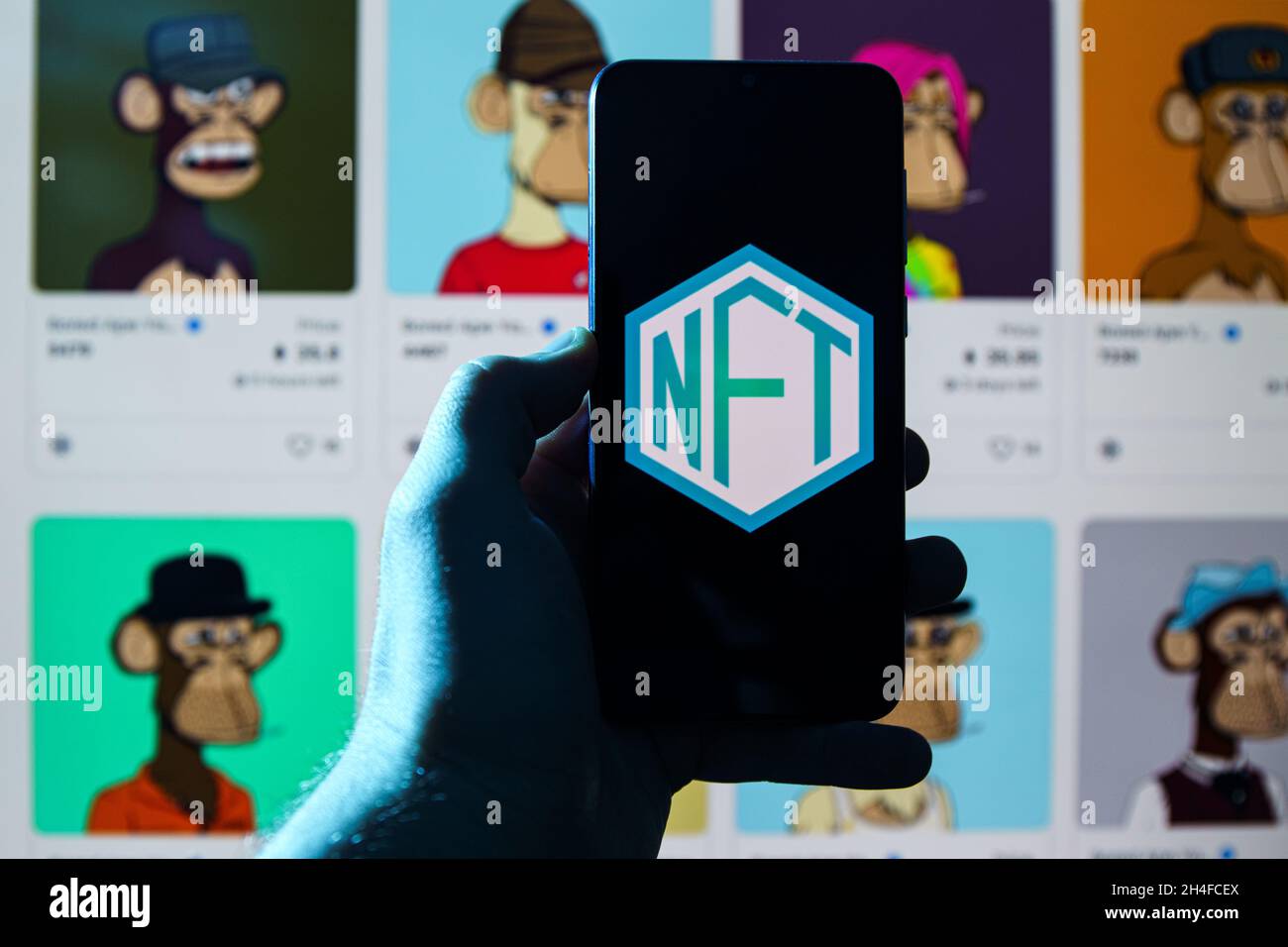 NTF logo on smartphone in NTF's background. A non-fungible token is a ...