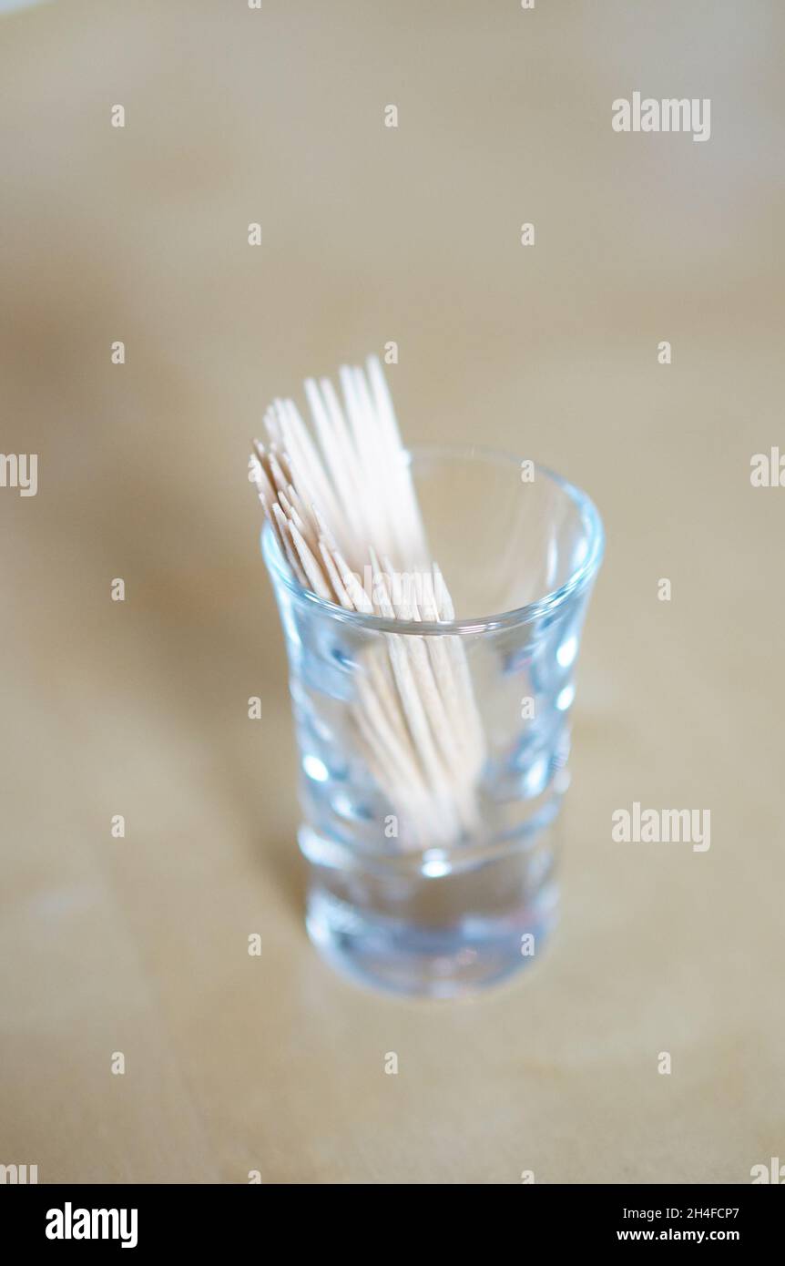 Group of wooden toothpicks in a glass Stock Photo - Alamy