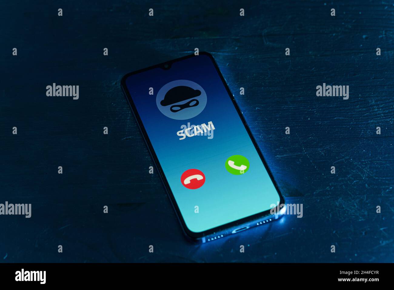 Incoming call from scammer. Scam call on phone Stock Photo - Alamy