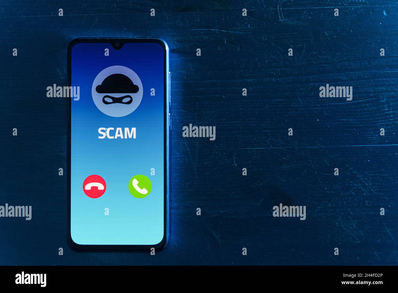 Incoming call from scammer. Scam call on phone Stock Photo - Alamy