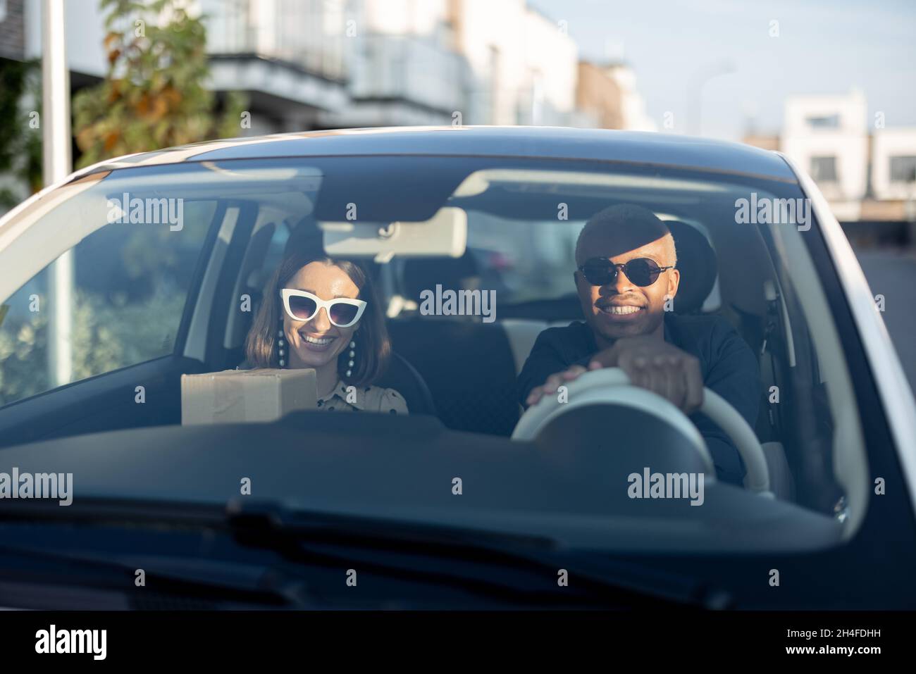 Couple riding in car together hi-res stock photography and images - Alamy