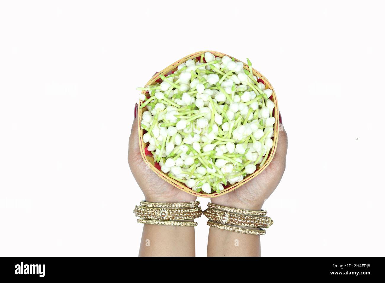 Hands Of Girl In Bangles Chhodi Holding Jasmine Buds Flowers In Bamboo ...