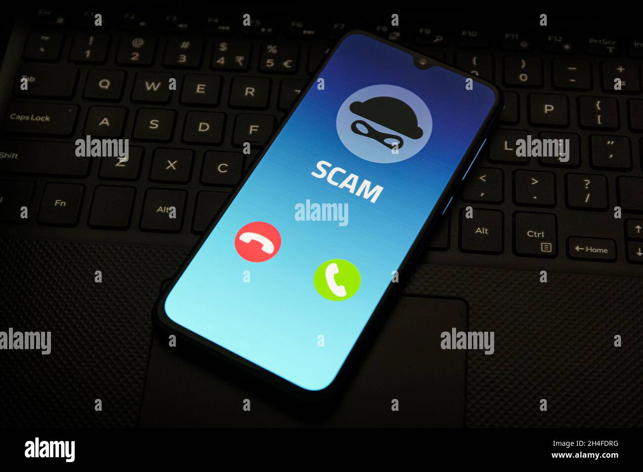 Incoming call from scammer. Scam call on phone Stock Photo - Alamy